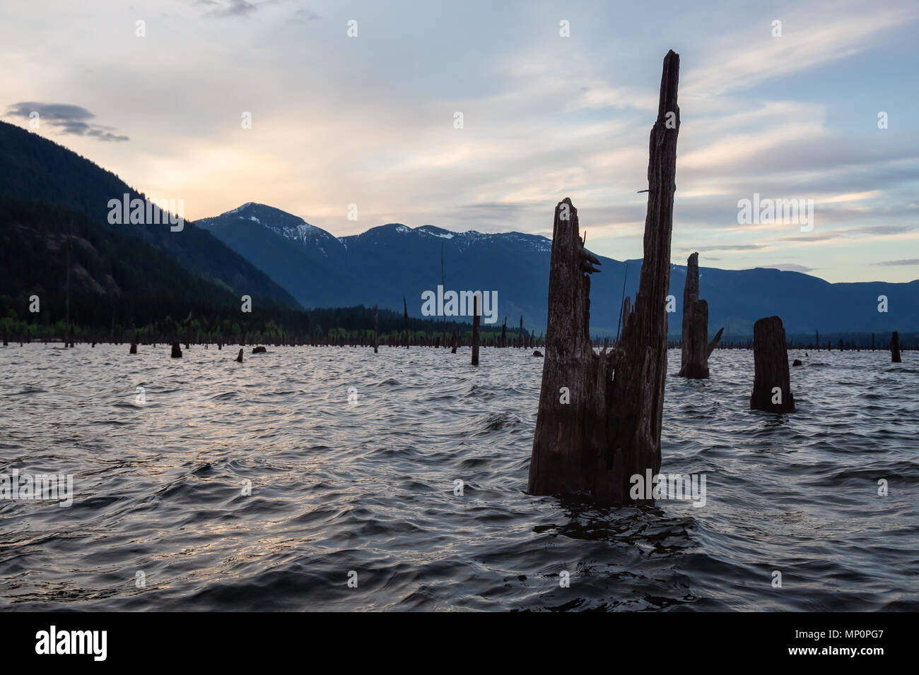 Striking view of Canadian Landscape during a cloudy sunrise. Taken in ...