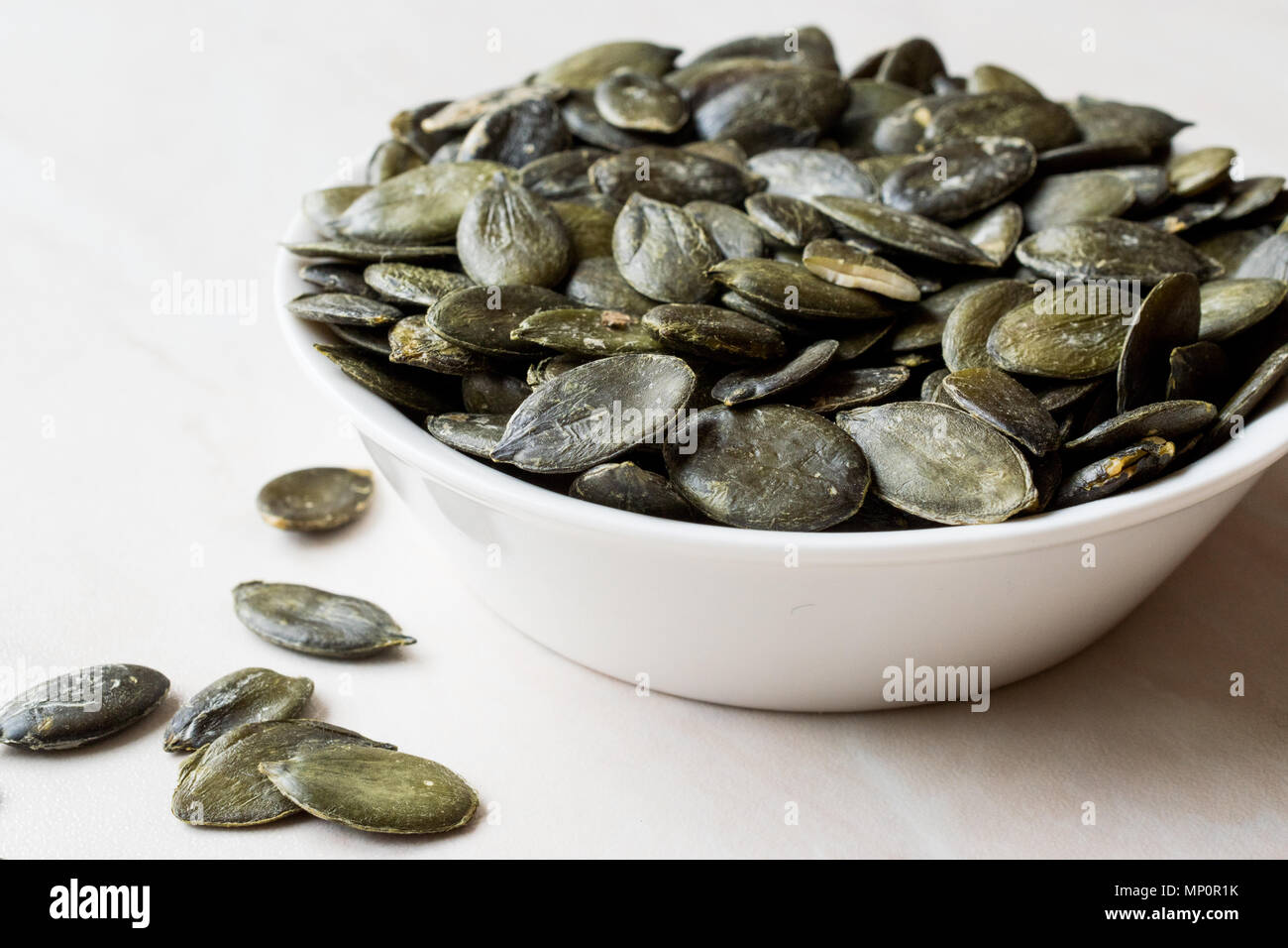 Raw Pumpkin Seeds Kernel in a bowl. Organic Food Stock Photo - Alamy