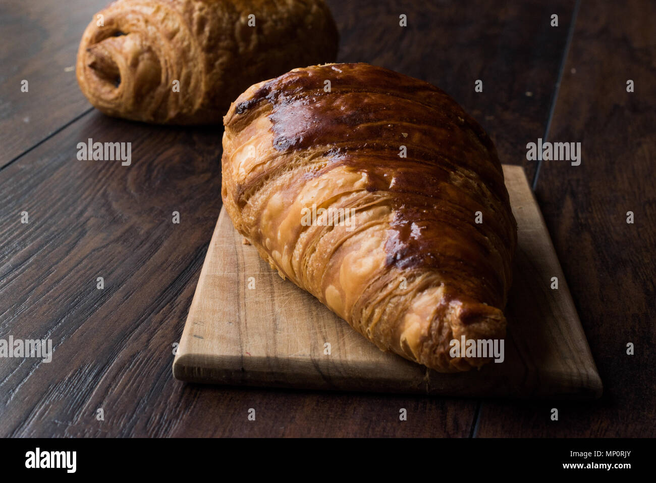 Freshly Baked Croissants on Wooden Surface. Bakery Concept Stock Photo ...