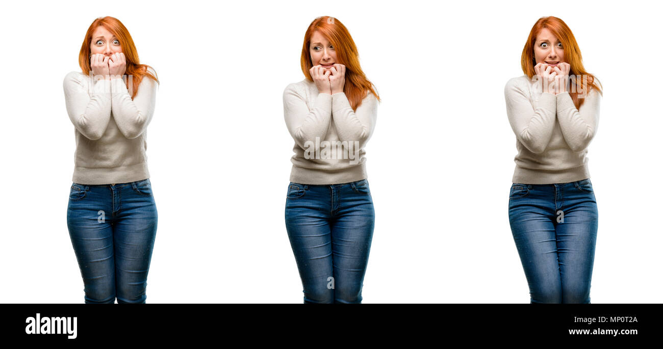 Young Beautiful redhead woman terrified and nervous expressing anxiety ...