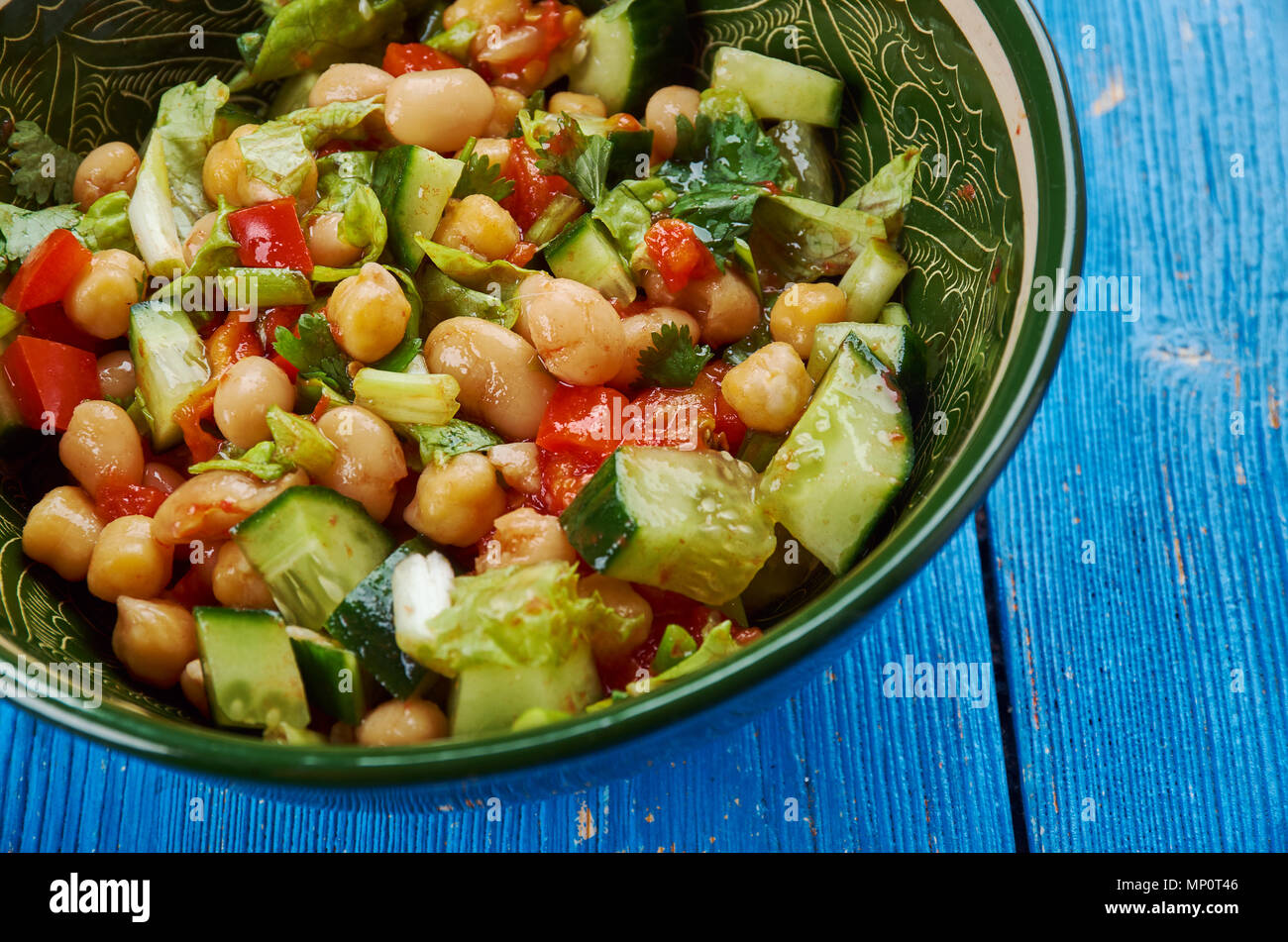 Balela - Middle Eastern-style bean salad, made with garbanzo and black ...