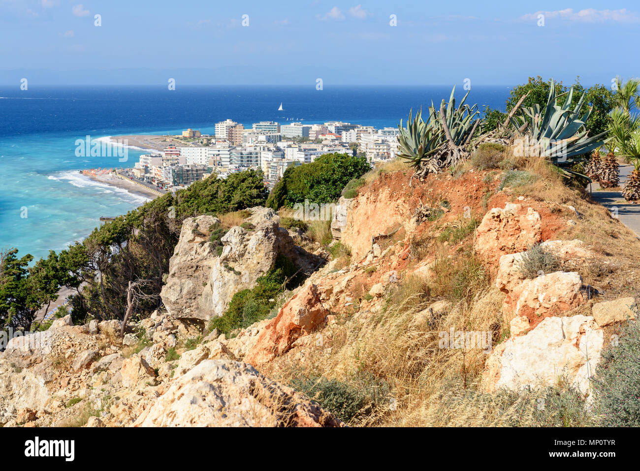 Rocks and view of sea and Rhodes town. Rhodes island, Greece Stock ...