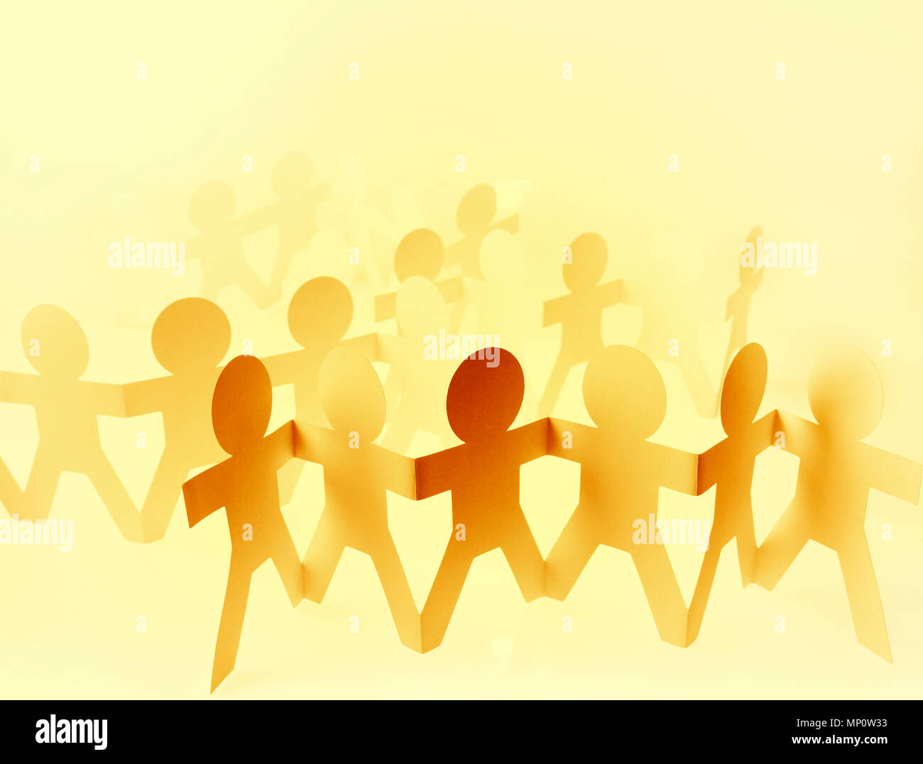 Group of paper chain people Stock Photo - Alamy