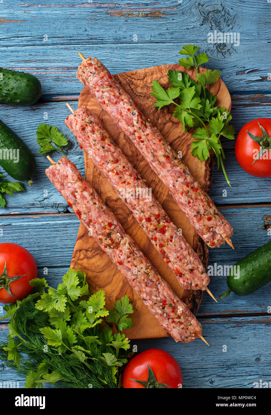 Minced meat skewers lula kebab Stock Photo - Alamy
