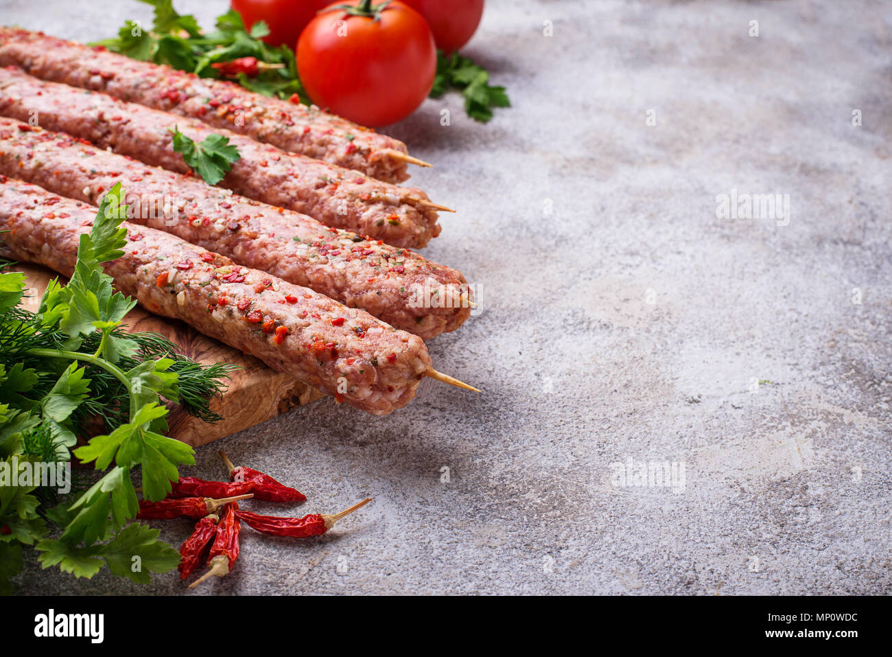 Minced meat skewers lula kebab Stock Photo - Alamy