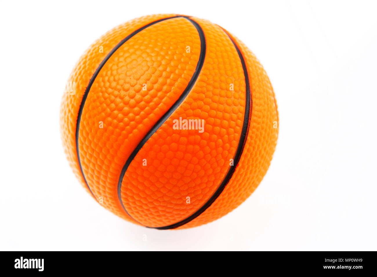 One basketball on plain background Stock Photo - Alamy