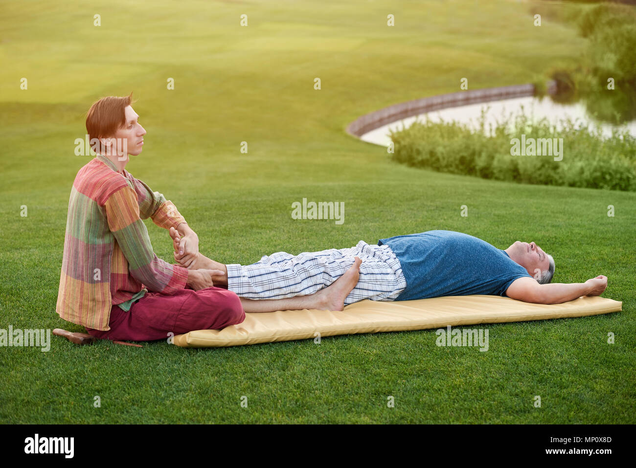 Man doing leg massage hi-res stock photography and images - Alamy