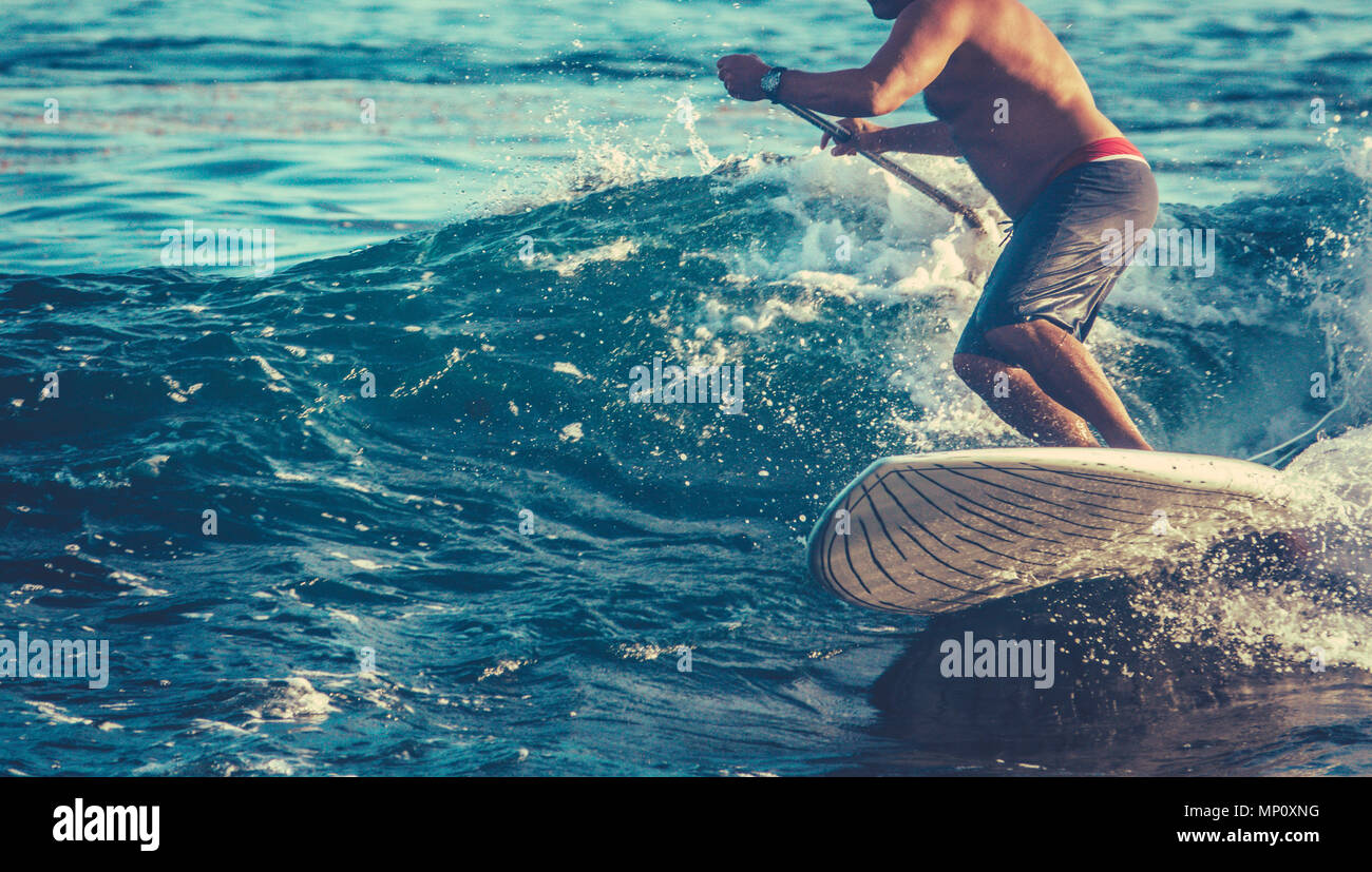 Retro Filtered Action Shot Of A Surfer In Hawaii With Copy Space Stock ...