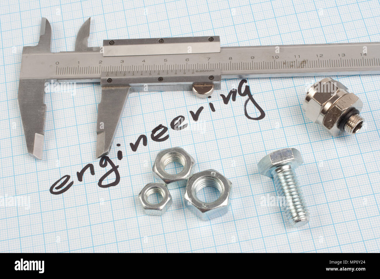 "engineering" - Screw and Nuts on graph paper background Stock Photo ...