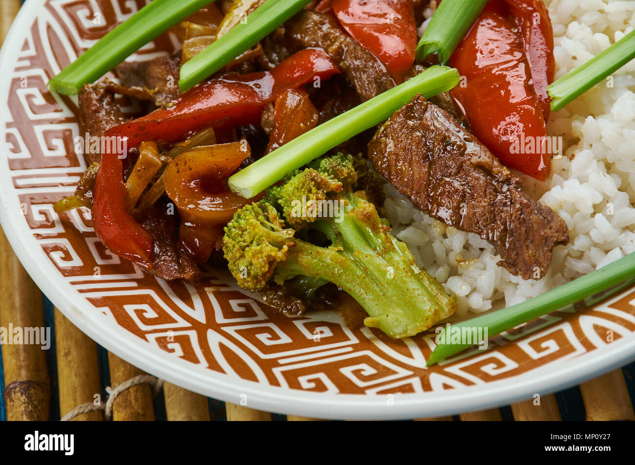 Goan Beef chilli flash fry with yoghurt rice , close up Stock Photo - Alamy
