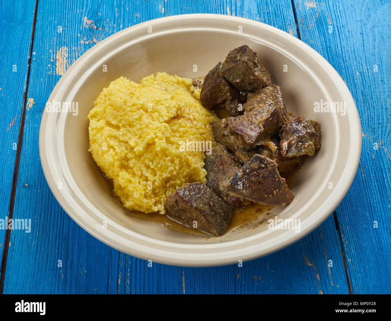 Tocana Pomana porcului - Romanian pork liver stew with corn porridge ...