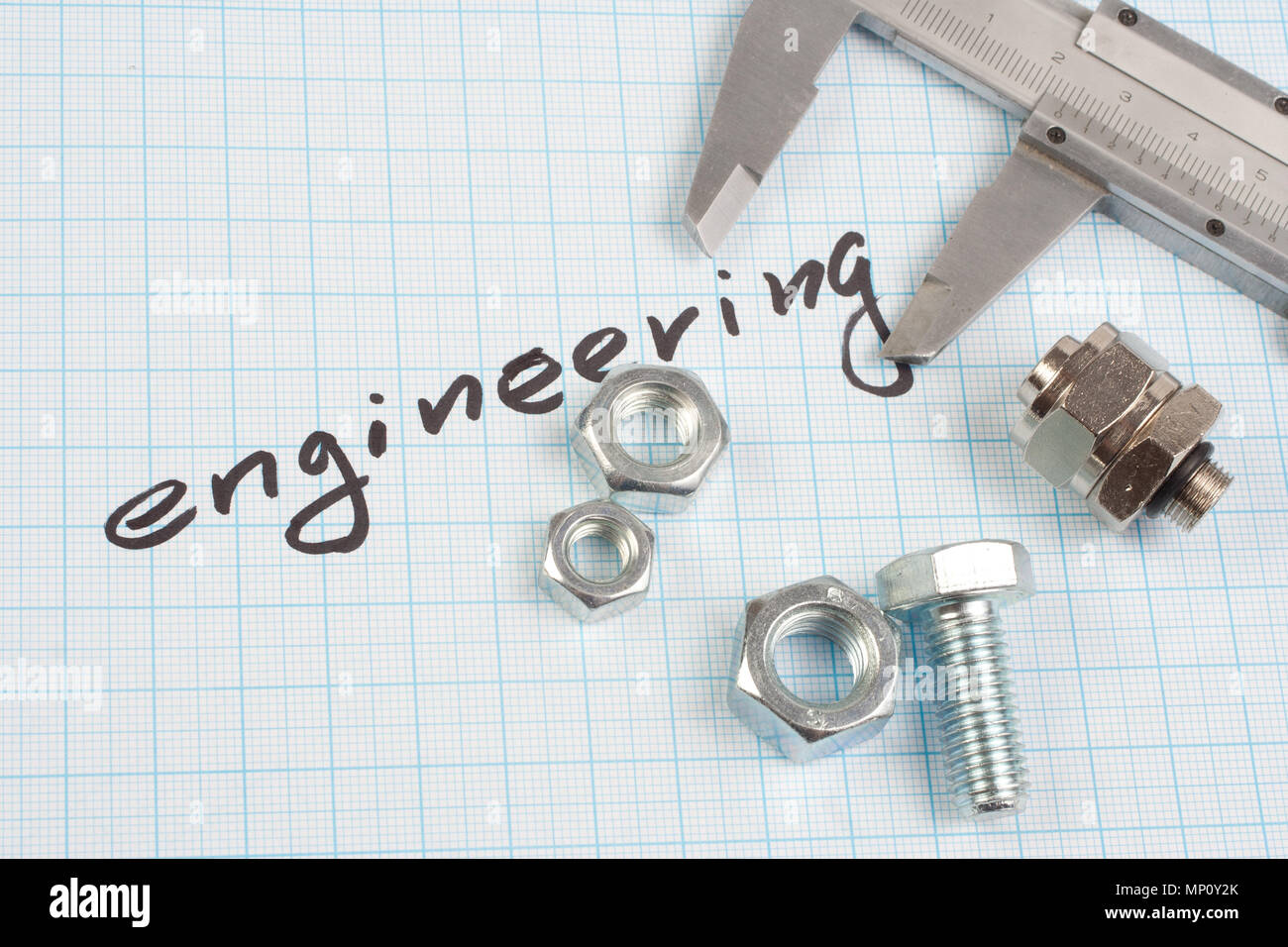 "engineering" - Screw and Nuts on graph paper background Stock Photo ...