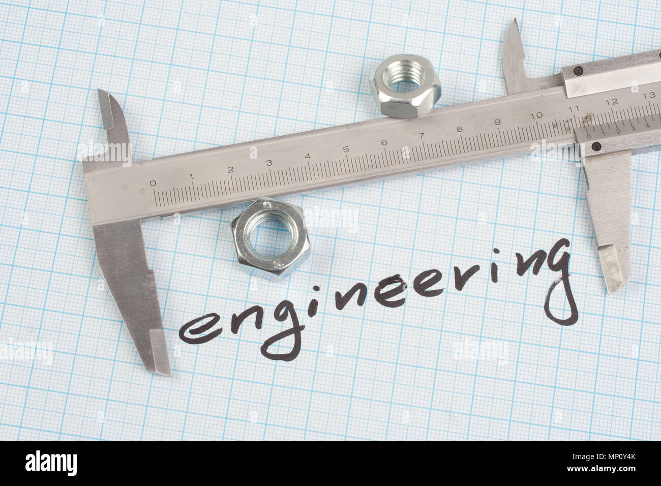 "engineering" - Screw and Nuts on graph paper background Stock Photo ...