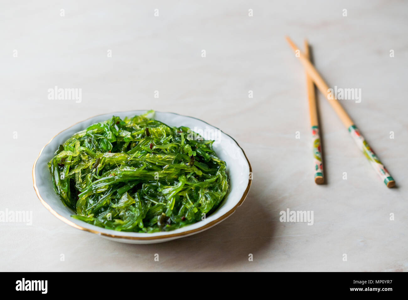 Japanese Wakame Seaweed Salad with Chopsticks. Traditional Organic Food ...