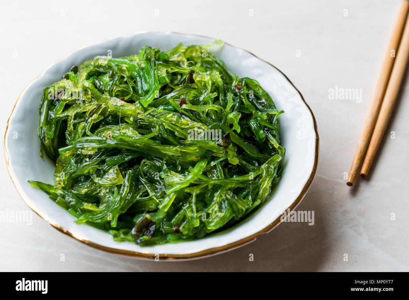 Japanese Wakame Seaweed Salad with Chopsticks. Traditional Organic Food ...