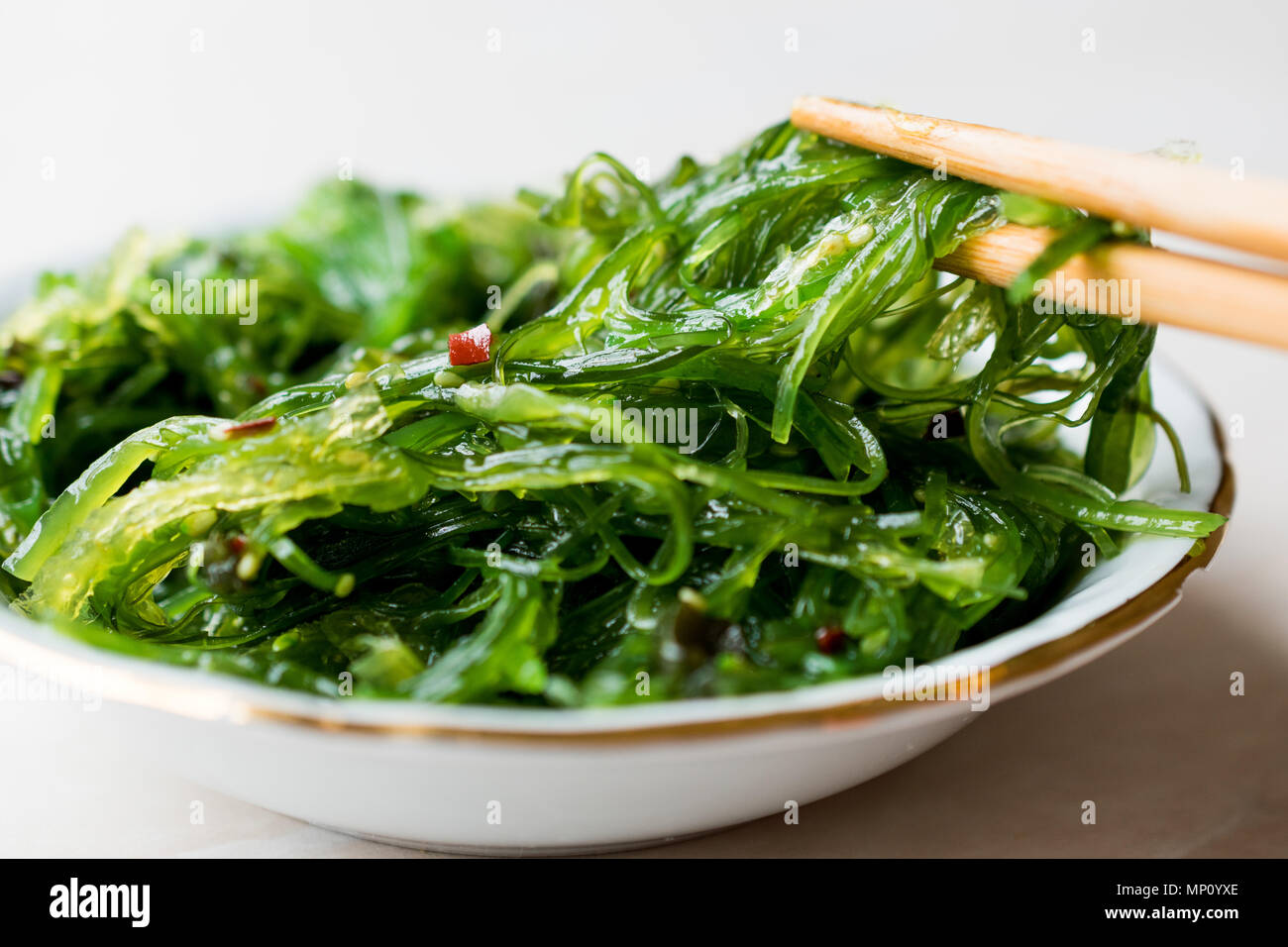 Japanese Wakame Seaweed Salad with Chopsticks. Traditional Organic Food ...