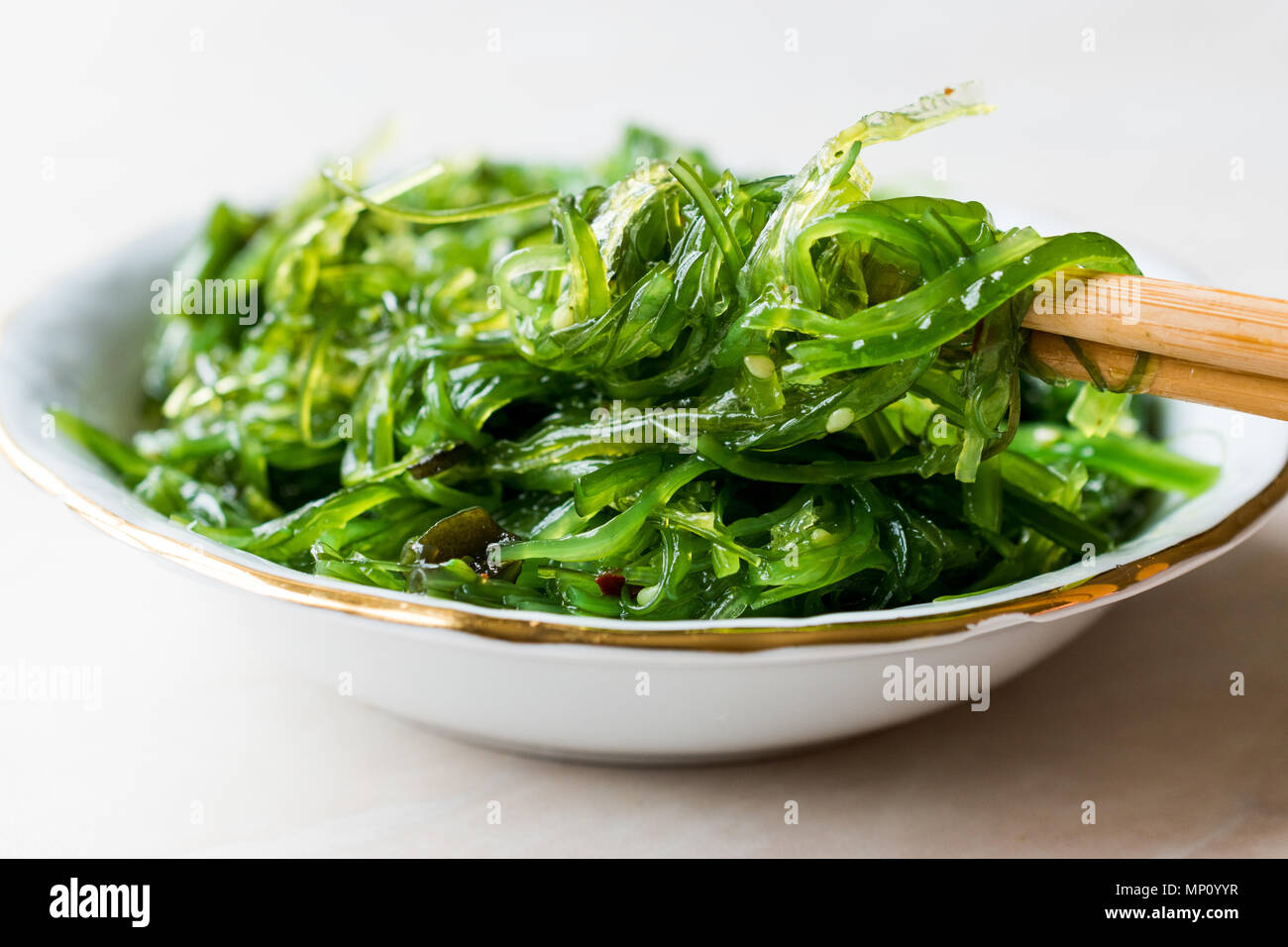 Japanese Wakame Seaweed Salad with Chopsticks. Traditional Organic Food ...
