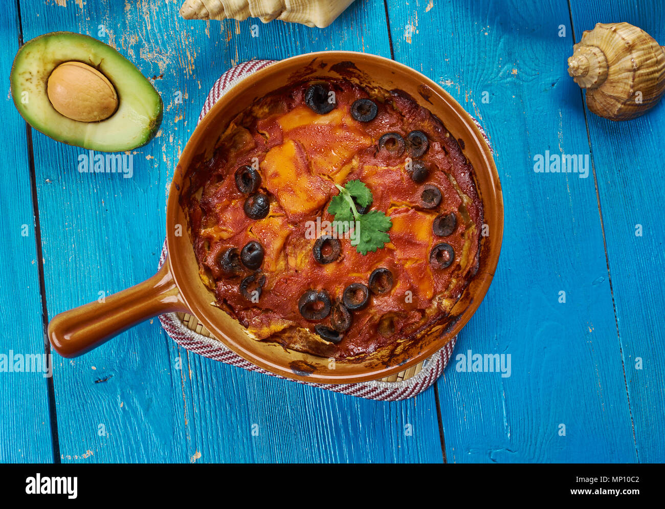 Mexican cuisine , Traditional Red Chilaquiles With Chicken, assorted ...