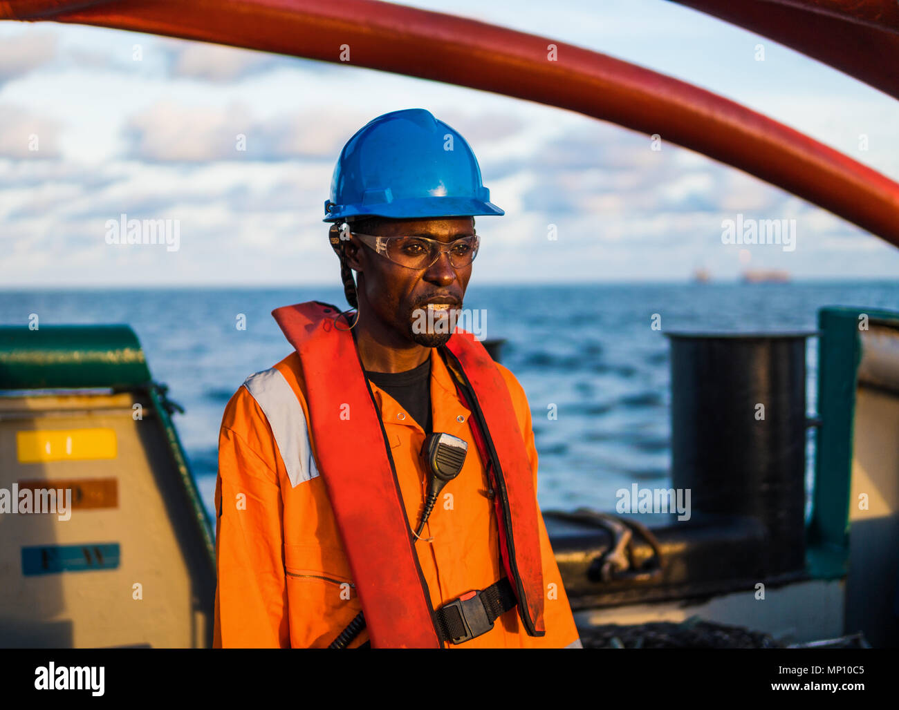 Seaman AB or Bosun on deck of vessel or ship , wearing PPE Stock Photo ...