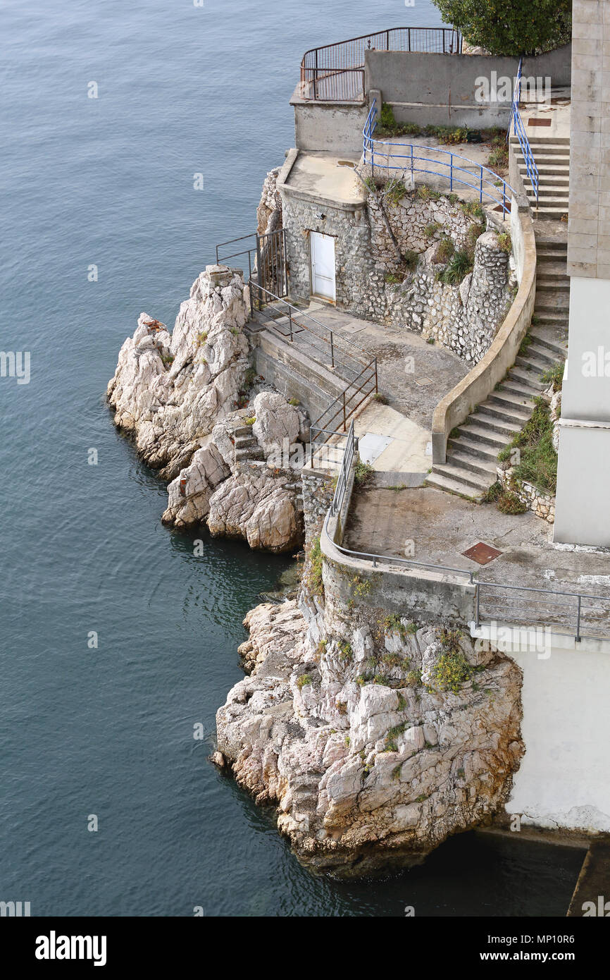 Stairs to Adriatic Sea at Rough Stone Coast Stock Photo - Alamy