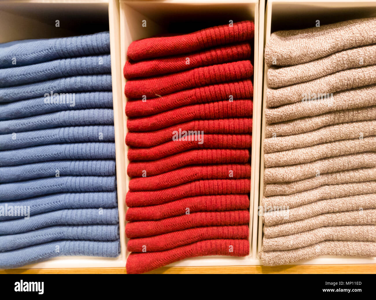 colorful socks stack on shelves for sale in clothing store Stock Photo ...