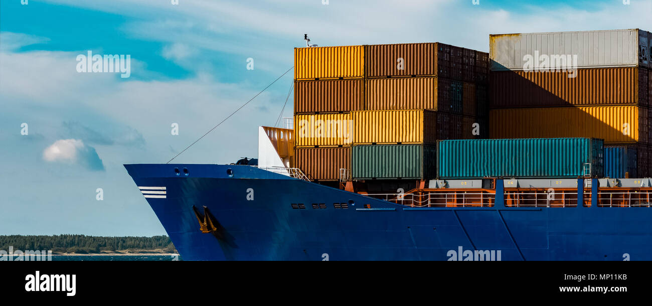 Blue container ship in travel. Logistics and freight industry Stock ...