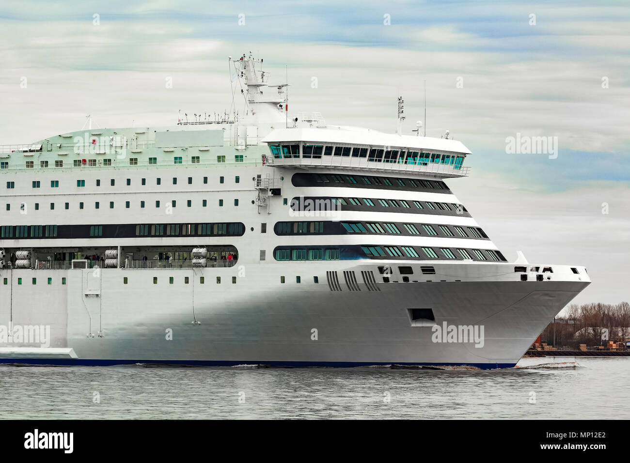 White cruise liner sailing on a clear day Stock Photo - Alamy