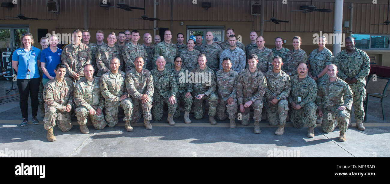 U.S. service members deployed to Camp Lemonnier, Djibouti, pose for a ...