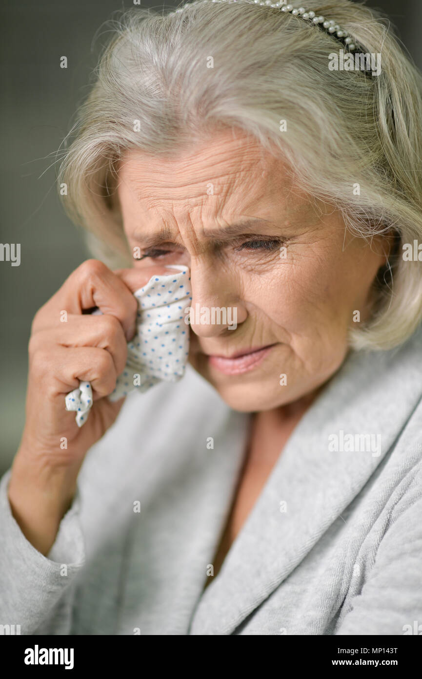 portrait of stressed senior woman Stock Photo - Alamy