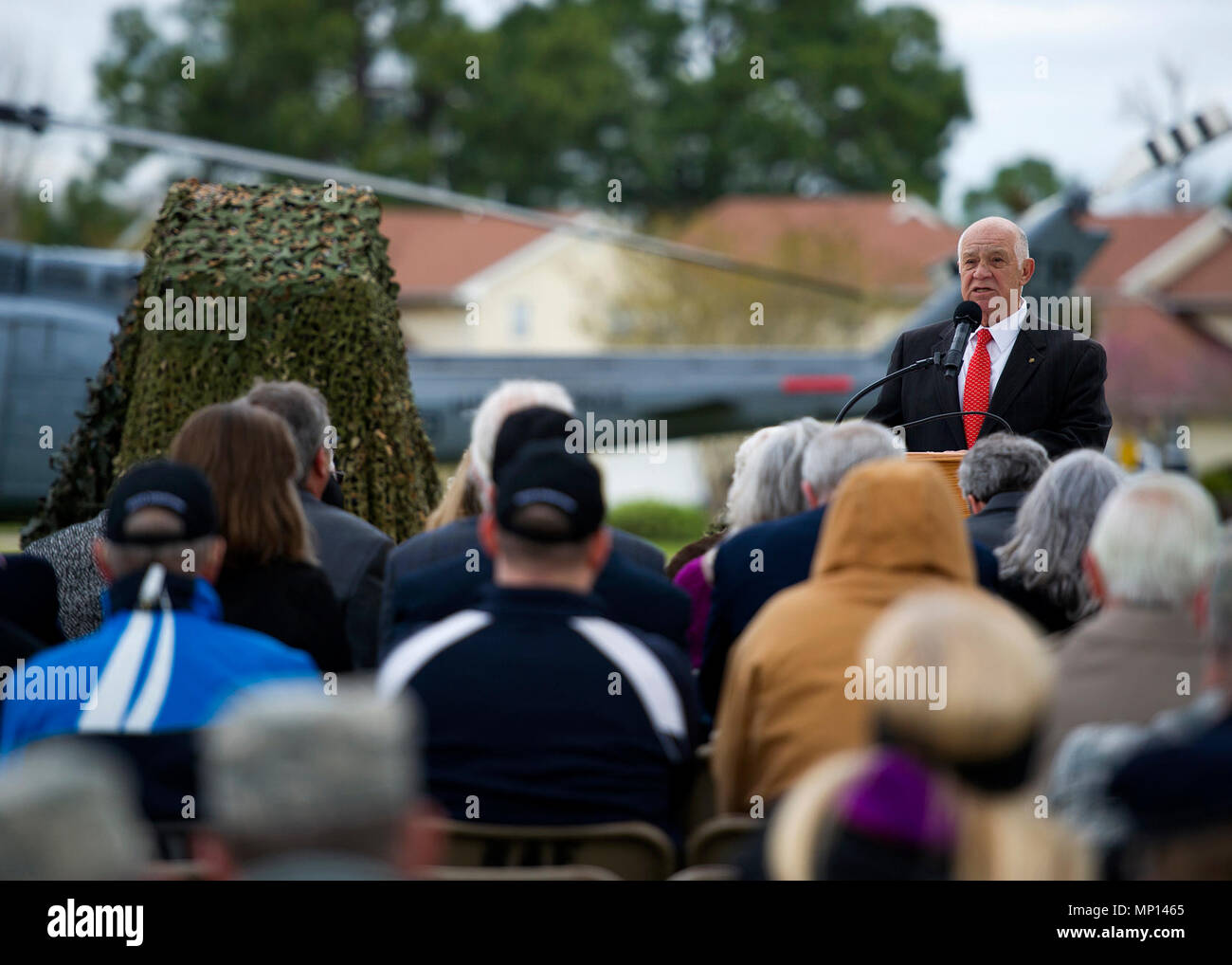 Retired Air Force Col. Joe Panza gives remarks before the unveiling of ...