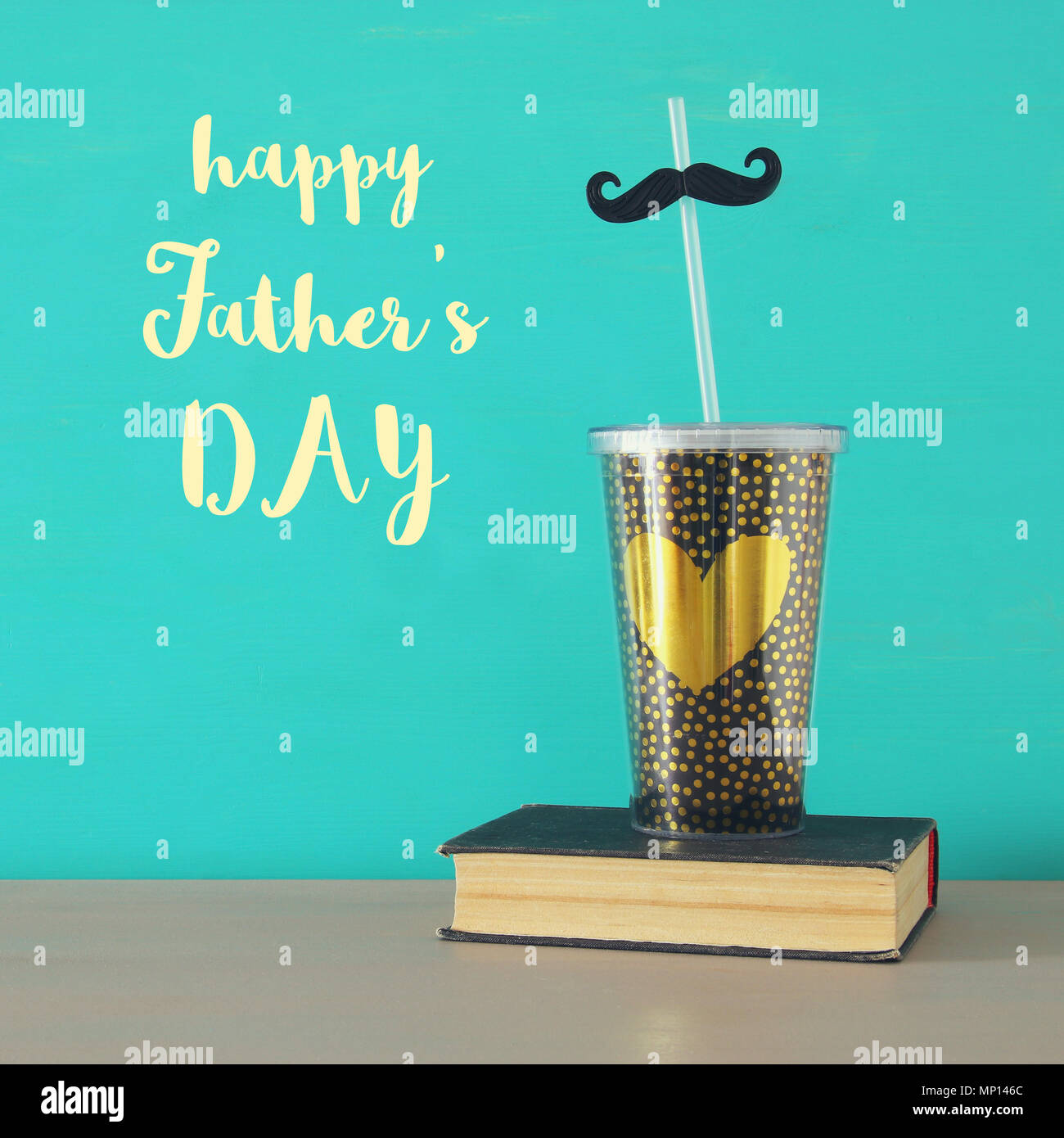 Image of plastic cup with golden heart. Father's day concept Stock ...
