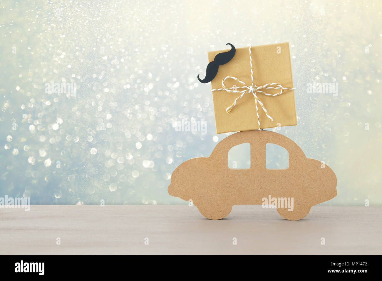Image of wooden car with gift box on the roof, present for dad. Father ...