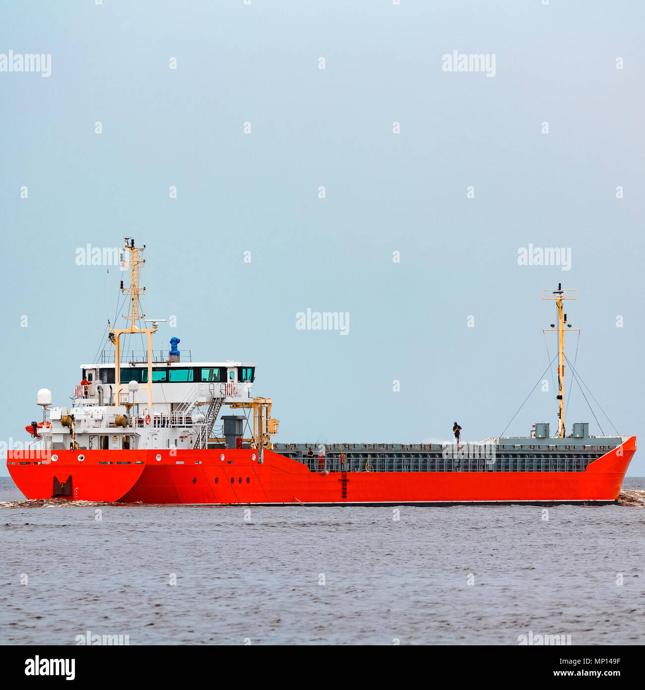 Orange cargo ship. Logistics and merchandise transportations Stock ...