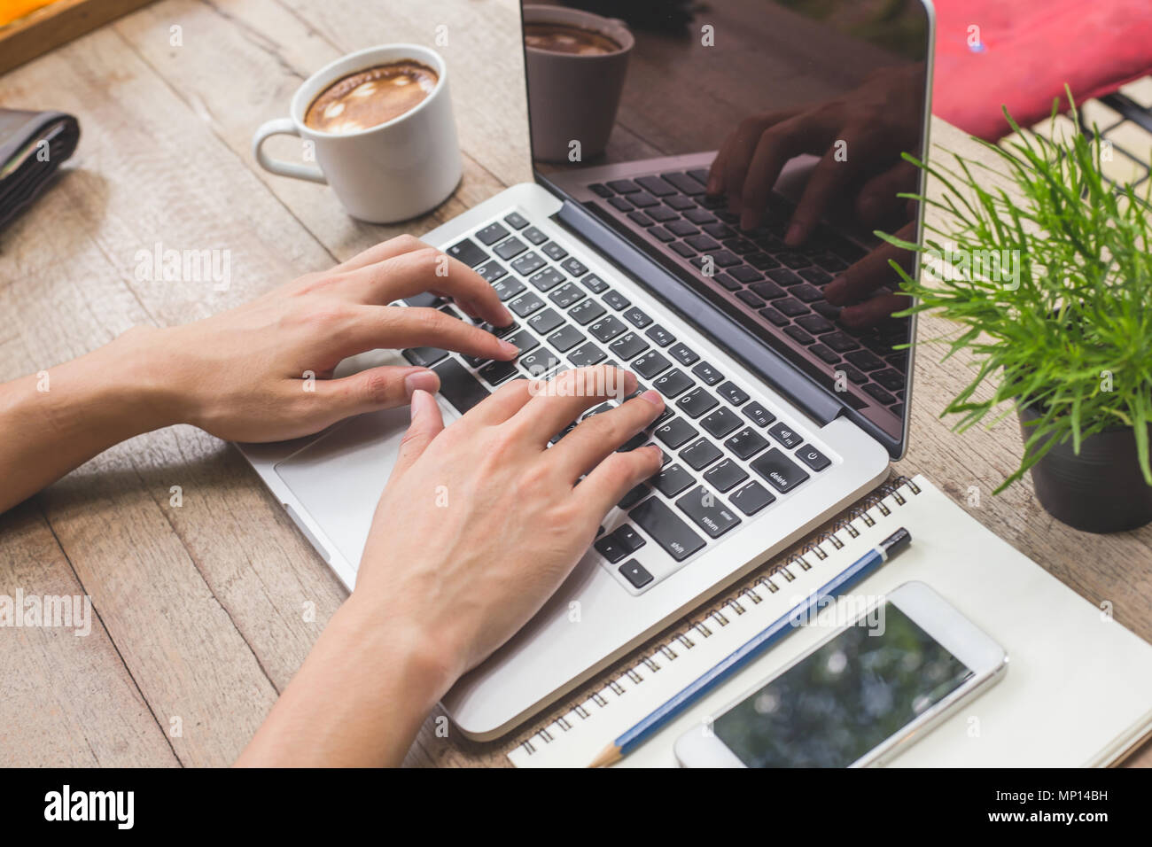 Man hands typing laptop computer in coffee shop Stock Photo - Alamy Man hands typing laptop computer in coffee shop Stock Photo - Alamy