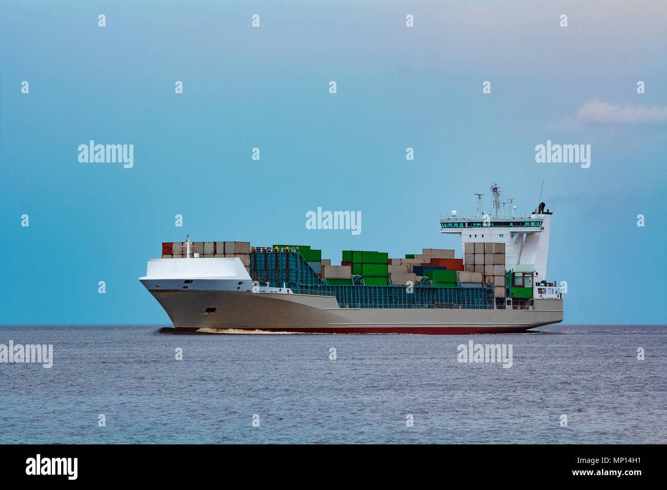Grey container ship. Logistics and production import Stock Photo - Alamy