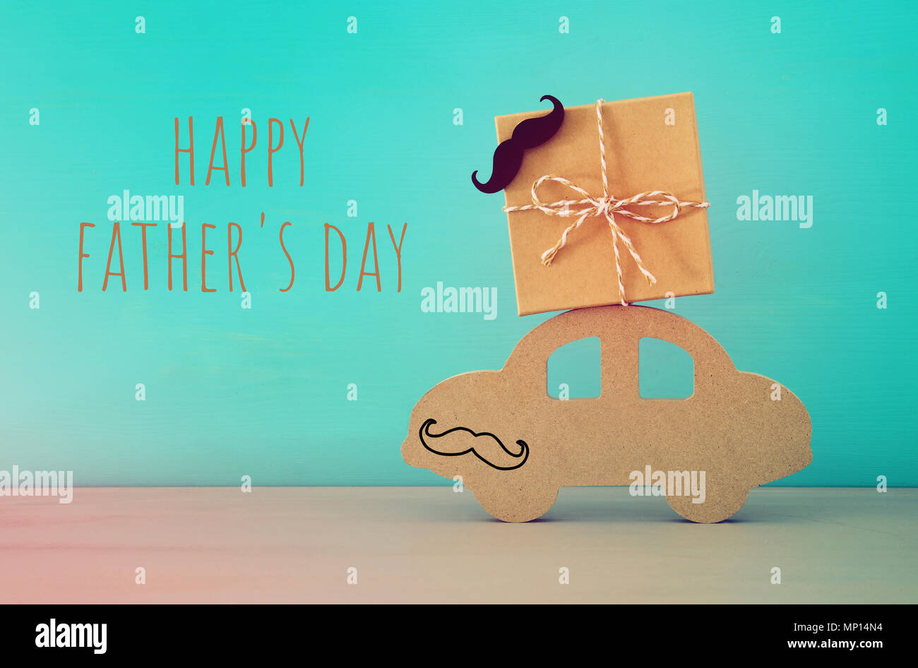 Image of wooden car with gift box on the roof, present for dad. Father ...