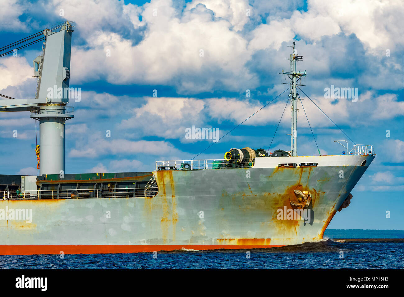 Grey cargo ship. Logistics and merchandise transportations Stock Photo ...