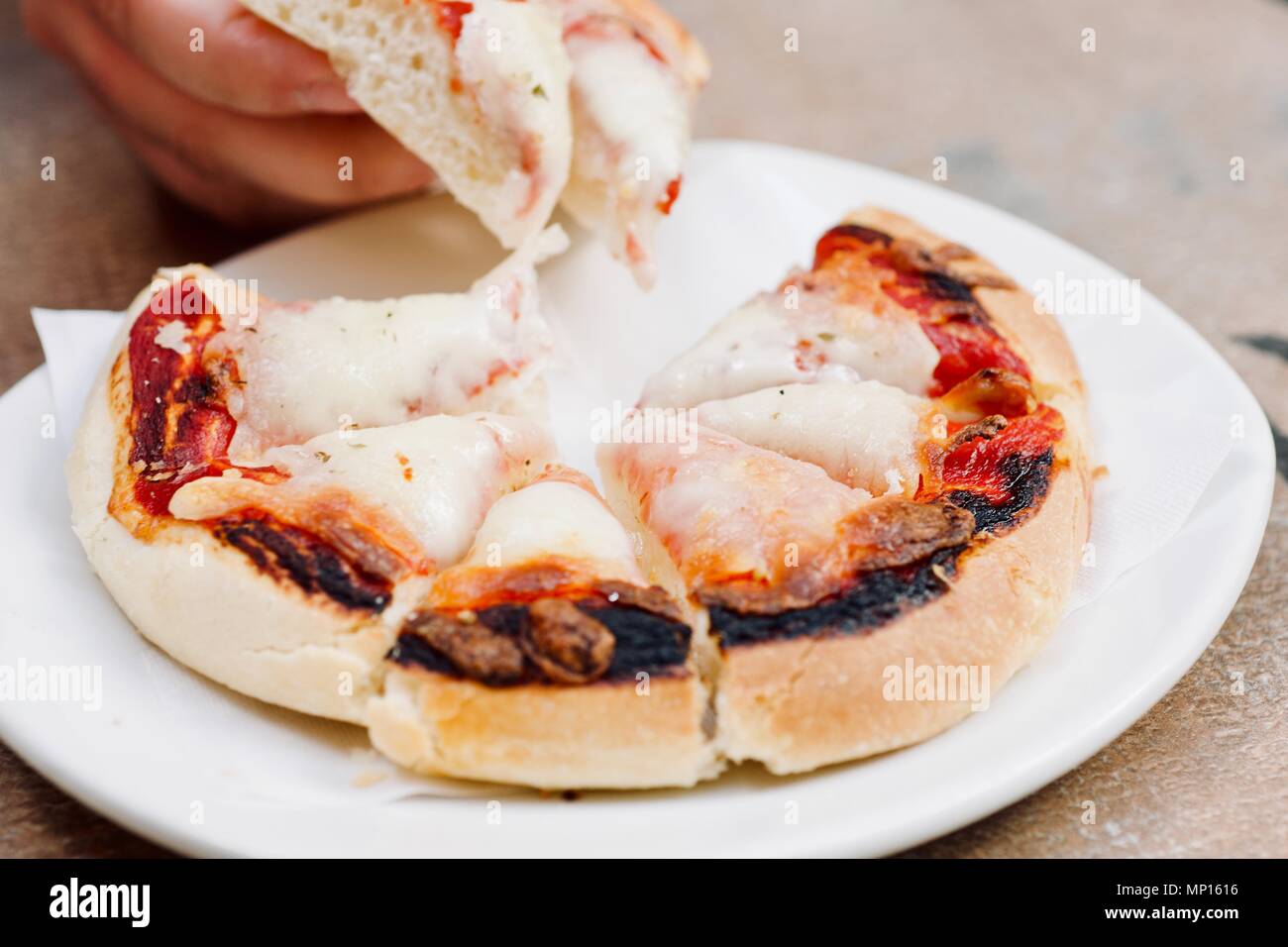 fresh tasty traditional small italian pizza fastfood, eating outside ...