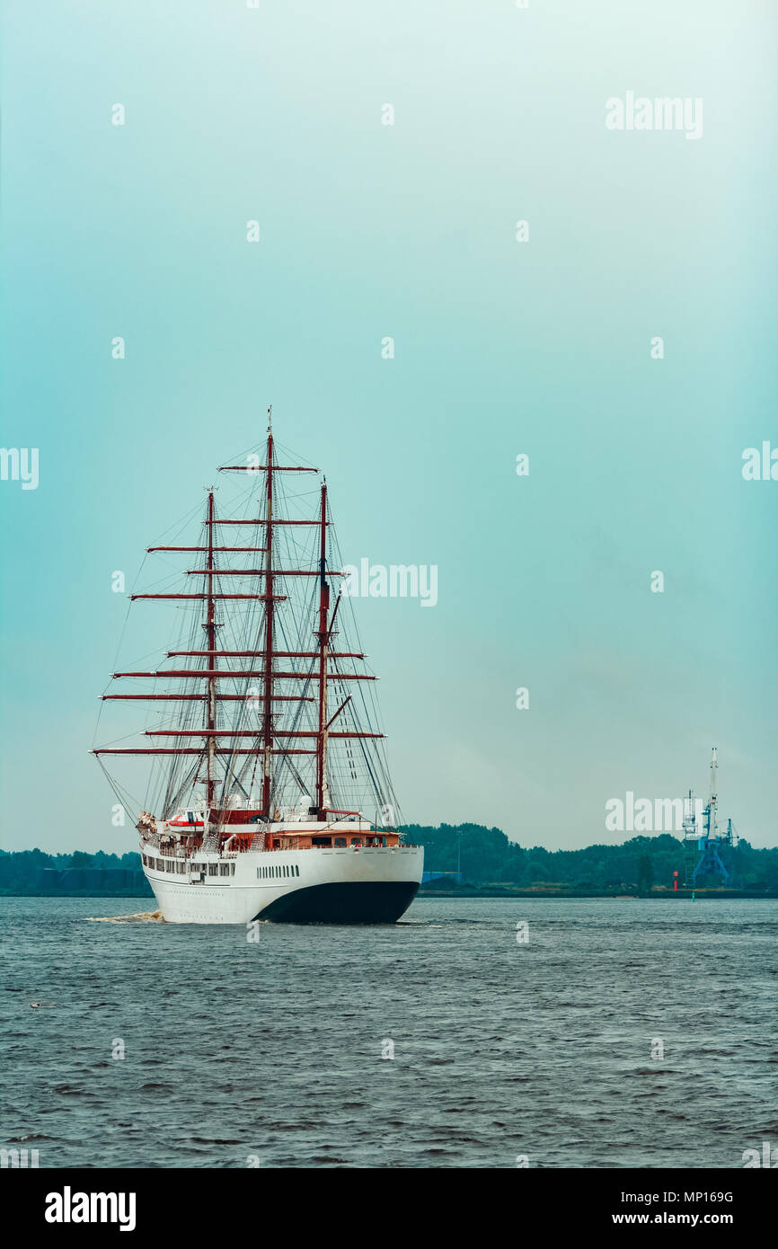 Big white sailing ship with three mast moving to the Riga port Stock ...