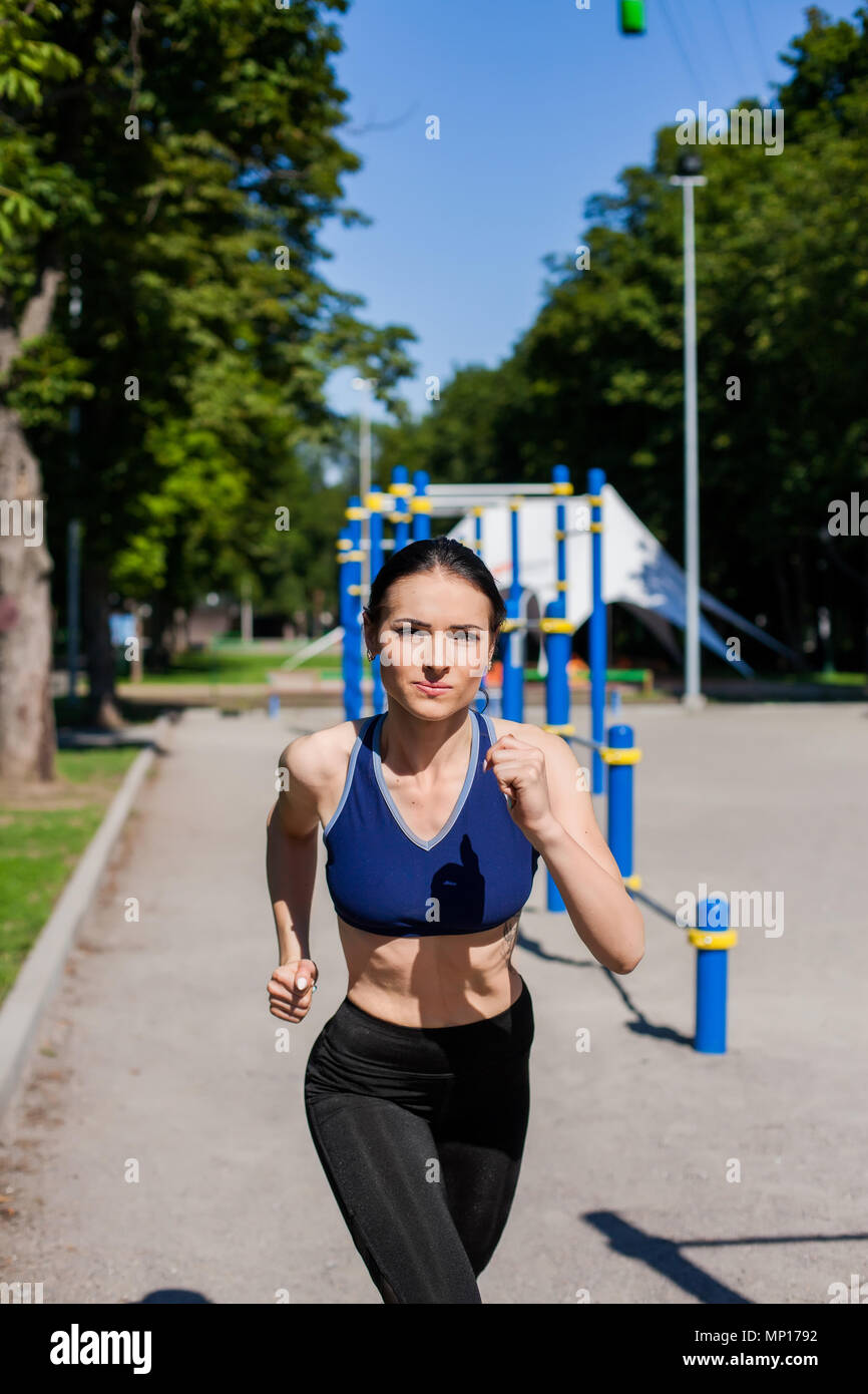 beautiful teen running on the sport playground Stock Photo - Alamy