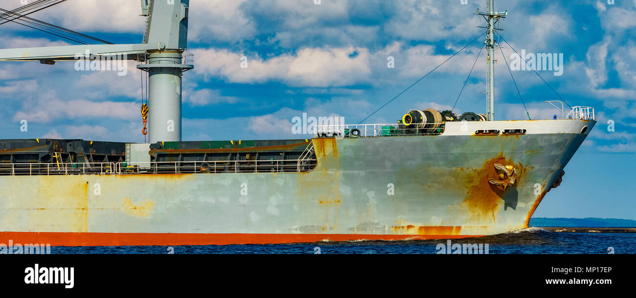 Grey cargo ship. Logistics and merchandise transportations Stock Photo ...