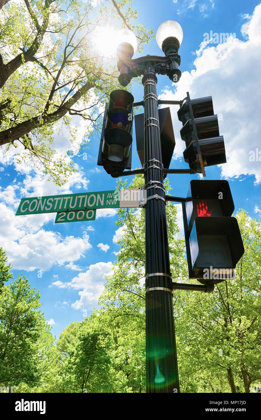 Constitution Avenue road sign and Traffic lights in Washington DC, USA ...