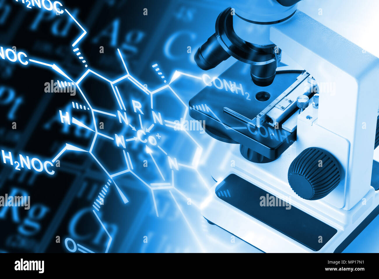Research microscope with molecule structural formula and periodic table ...