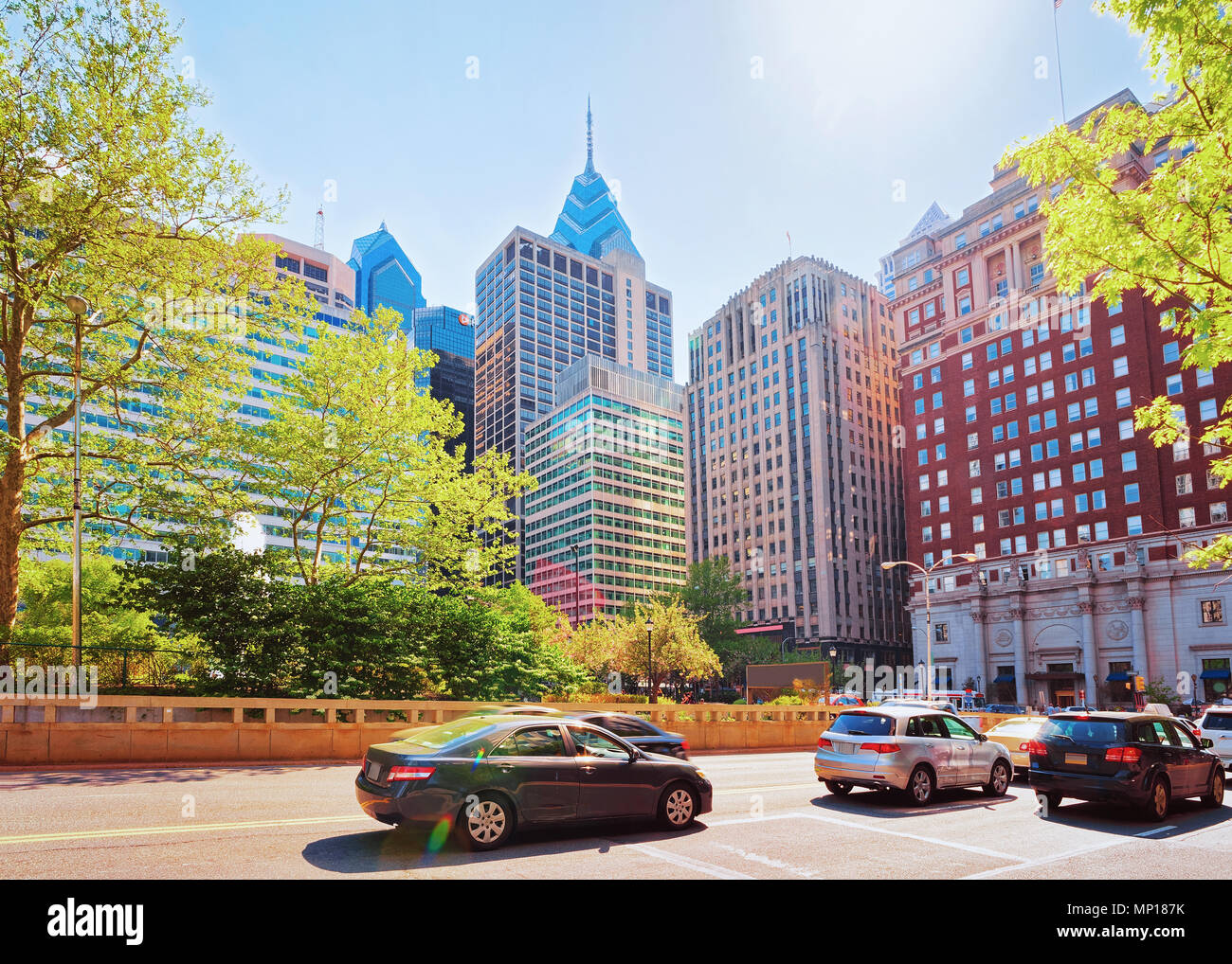 Road at Love Park and Penn Center with skyline of skyscrapers in ...