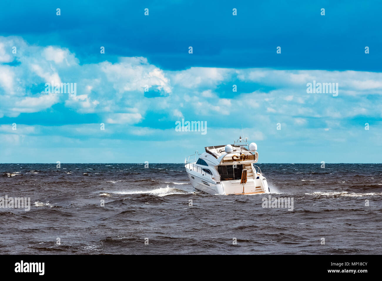 White speed boat moving fast to the Baltic sea. Water sport Stock Photo ...