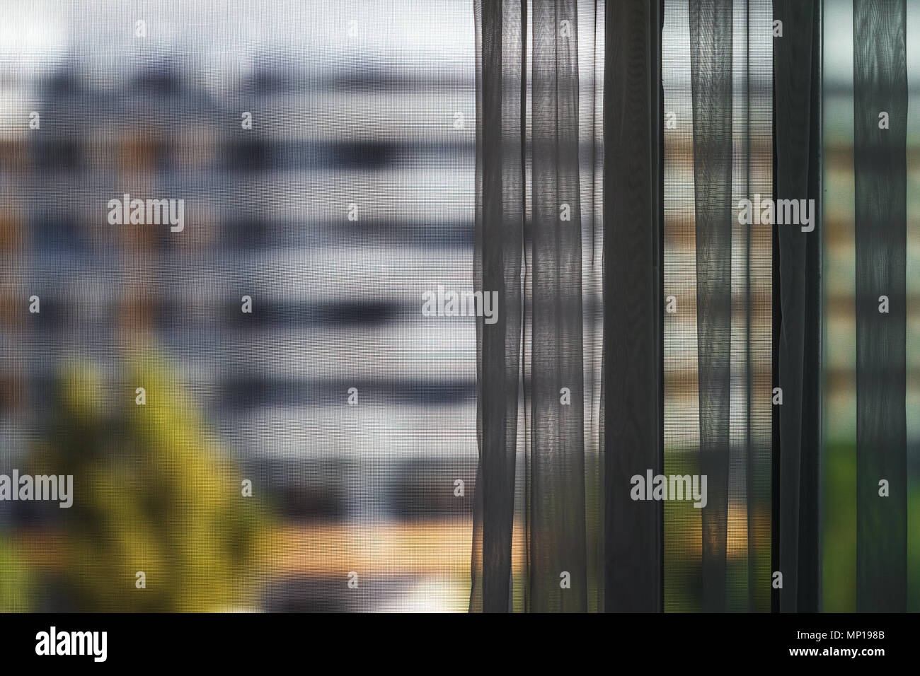 blurred view of building through the window Stock Photo - Alamy