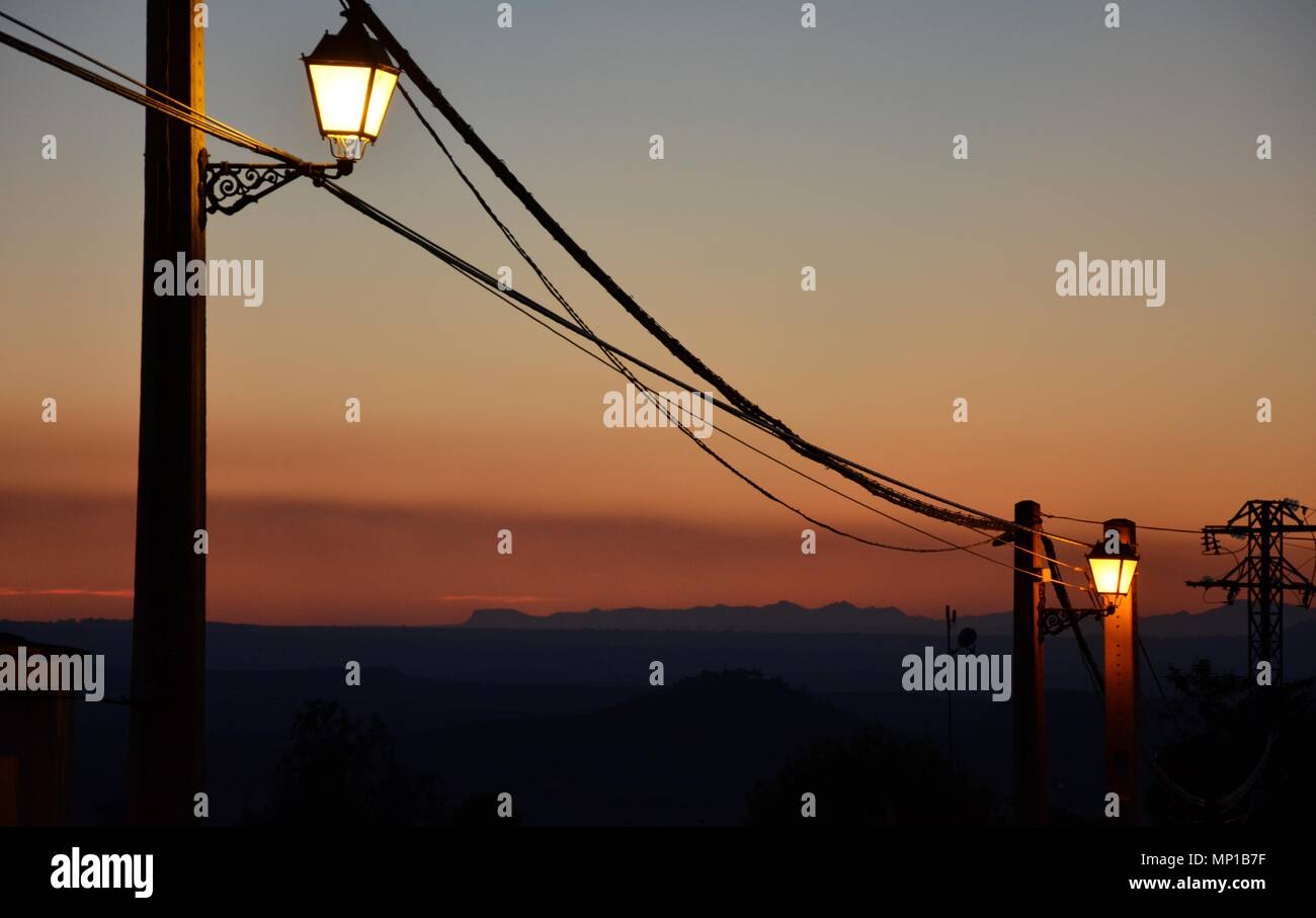 streetlights in the dark sunset Stock Photo - Alamy