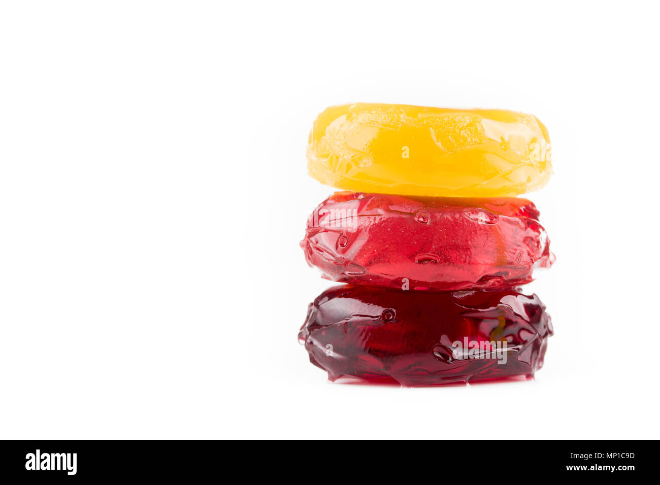 Wrapped orange flavor candy hi-res stock photography and images - Alamy
