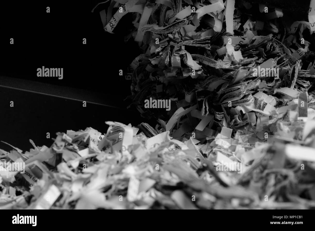 Data protection - paper in the shredder destroyed Stock Photo - Alamy