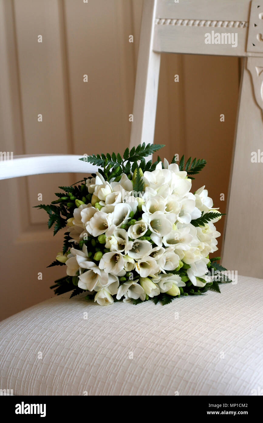 Bouquet of white flowers waiting for the bride Stock Photo - Alamy